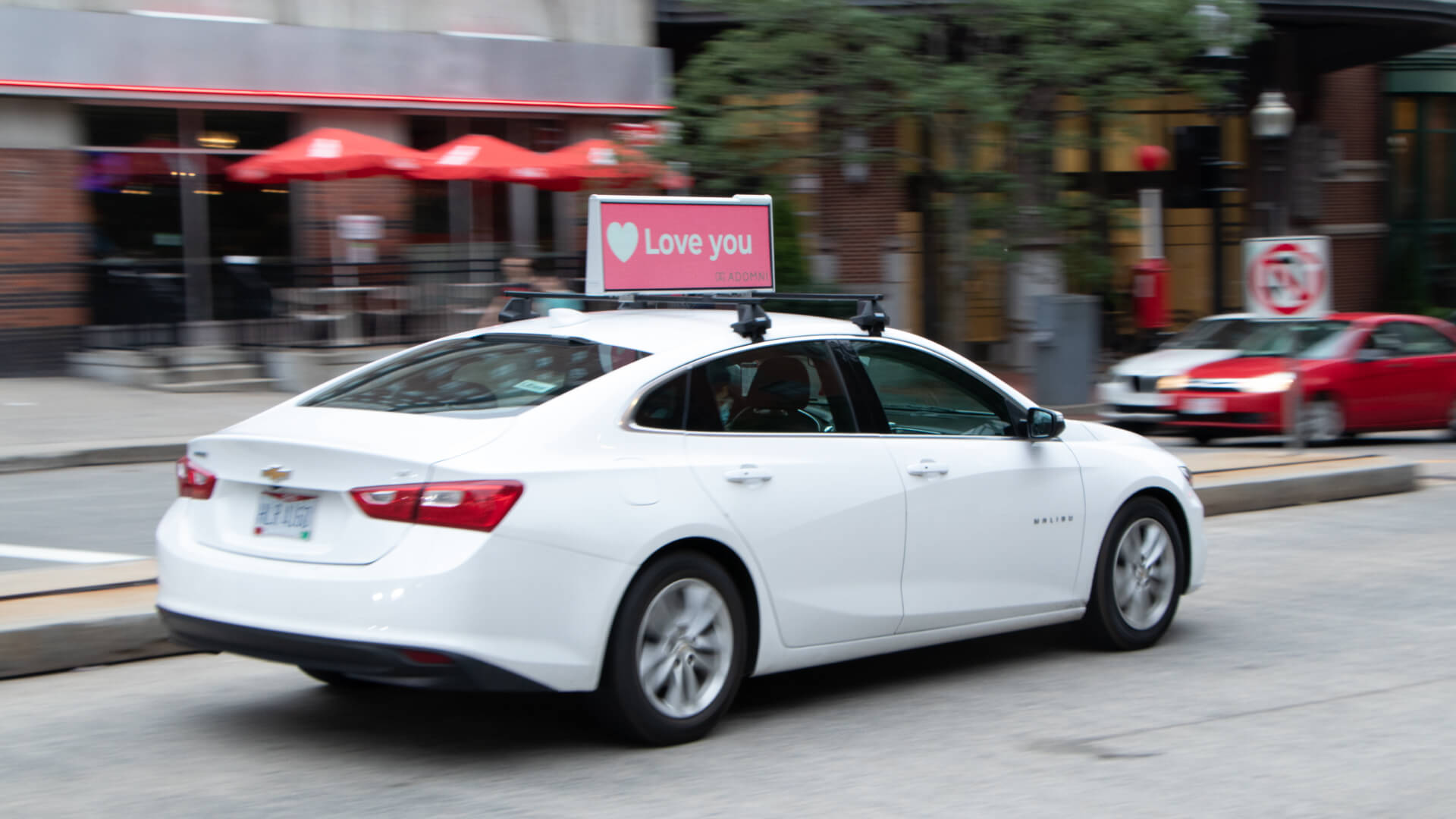 Adomni - Deals on wheels: Rideshare cars sport OOH ads